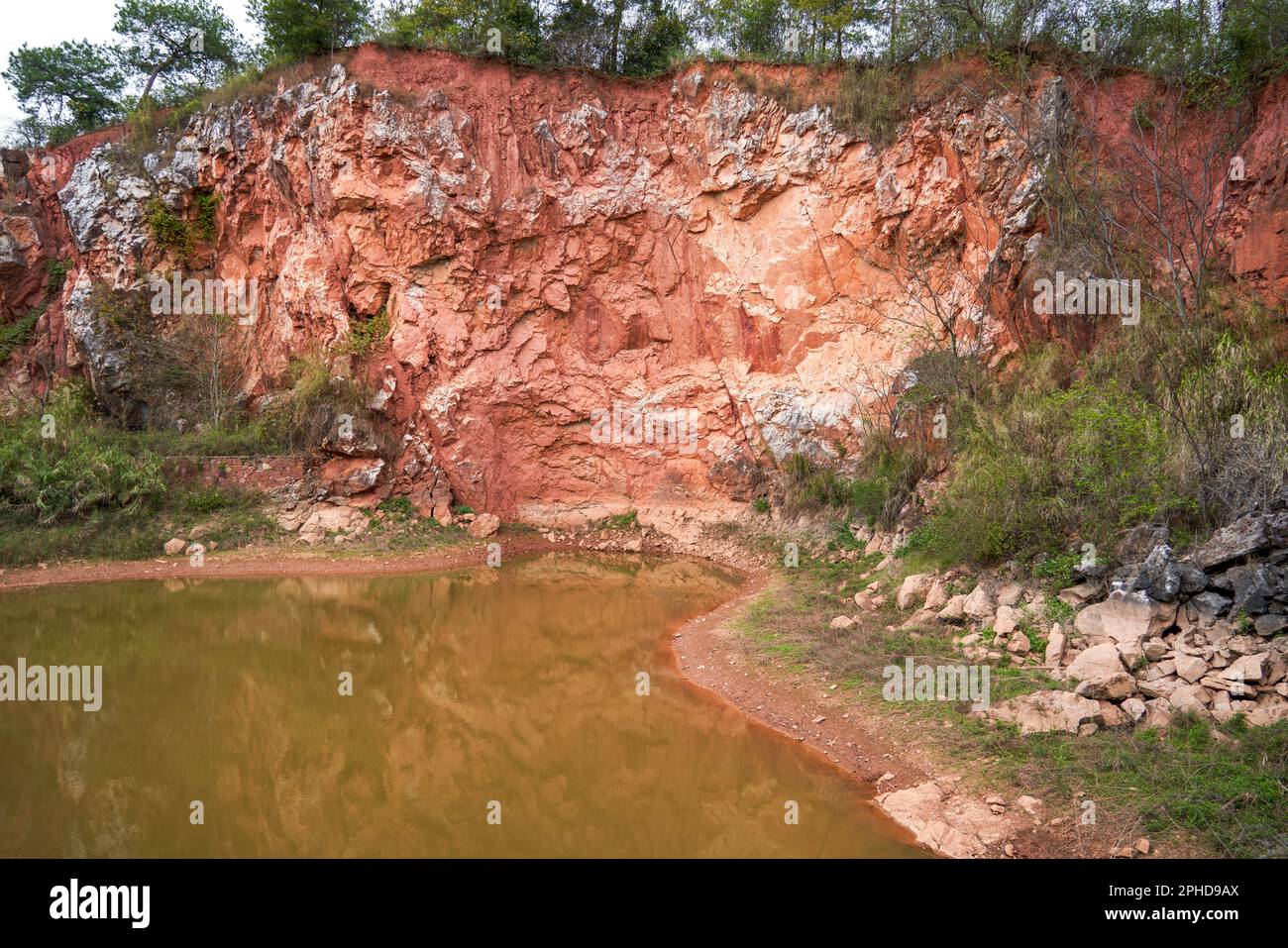 Mining hills and water holes in a mine Stock Photo - Alamy