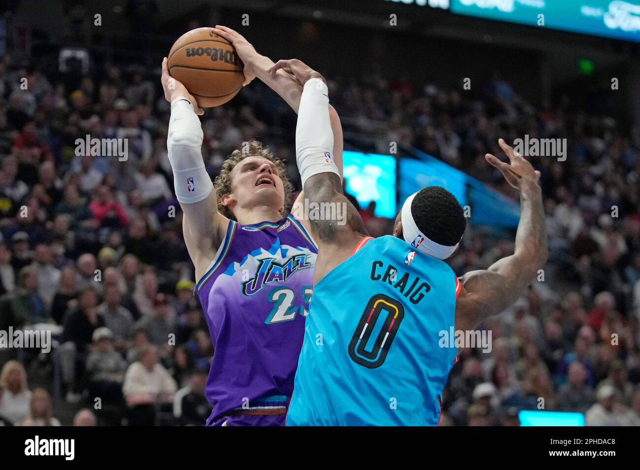 Phoenix Suns forward Torrey Craig (0) defends against Utah Jazz forward ...