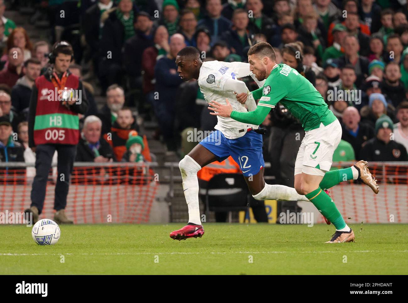 Dublin, Ireland. 27th Mar, 2023. Rando Kolo Muani of France, Matthew ...
