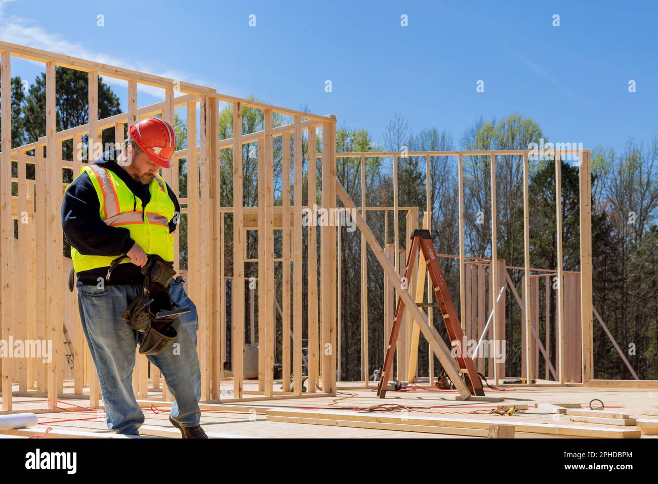Construction worker hammering framework hi-res stock photography and ...