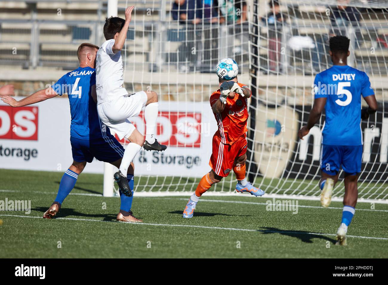 Austin Pack (1) of the Charlotte Independence punches the ball away ...