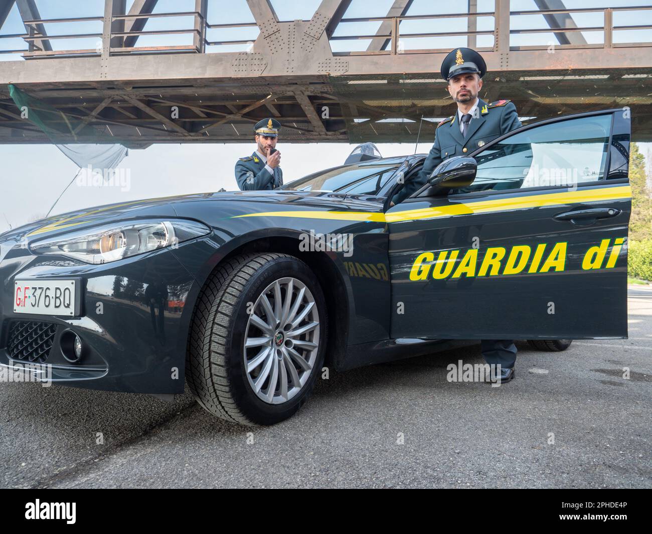 Cremona, Italy - February 2023 two tax police officers in duty near Po ...