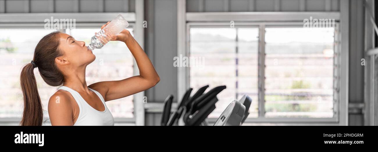 Gym fitness woman drinking water bottle dehydrated during run workout ...