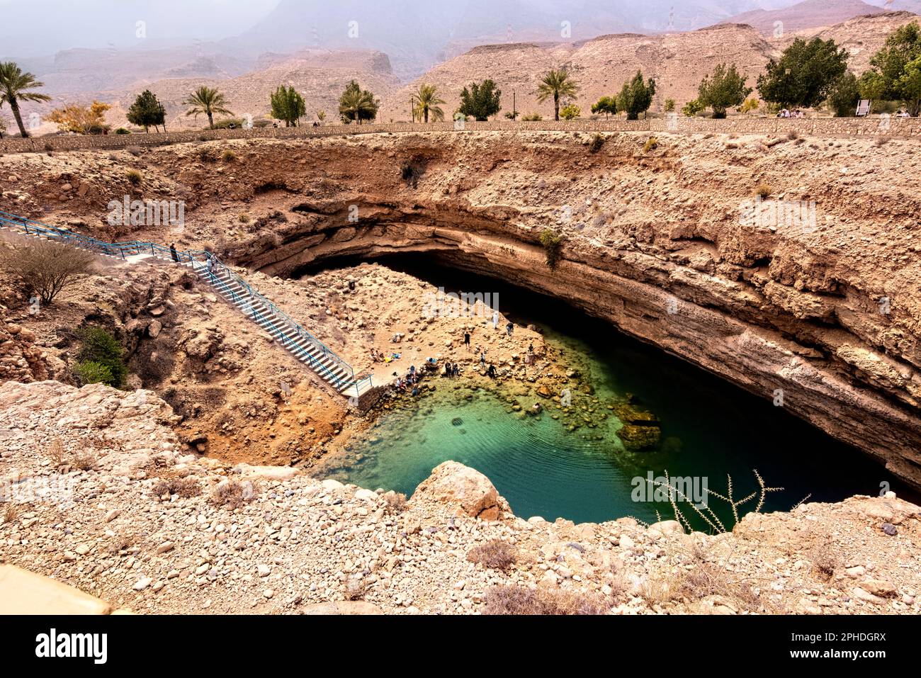 Bimmah sinkhole in Hawiyyat Najm Park, Dibab, Oman Stock Photo - Alamy