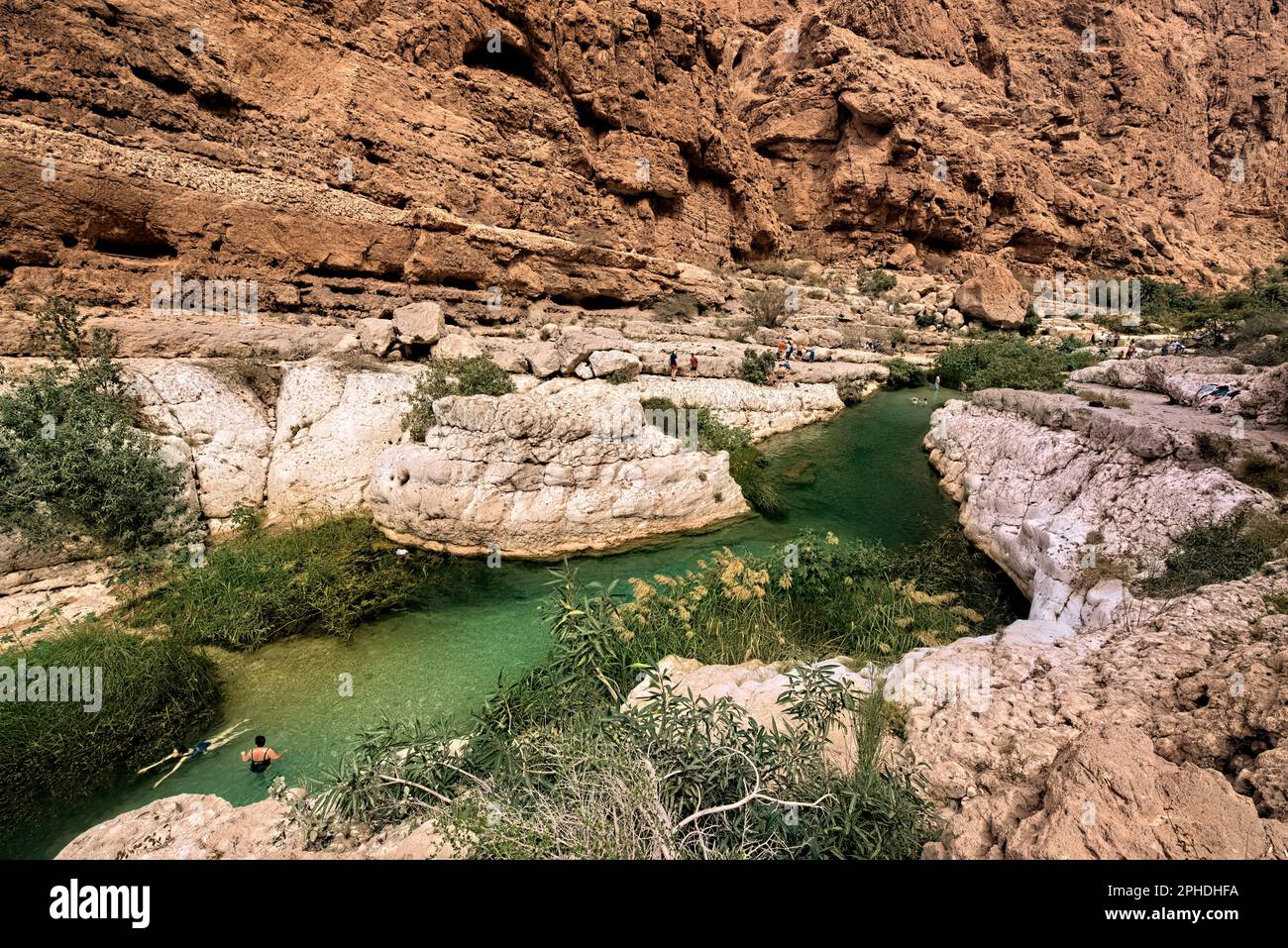 Turquoise water flowing through the Wadi Shab canyon, Wadi Ash Shab ...