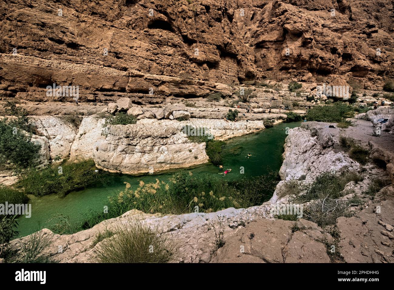 Turquoise water flowing through the Wadi Shab canyon, Wadi Ash Shab ...