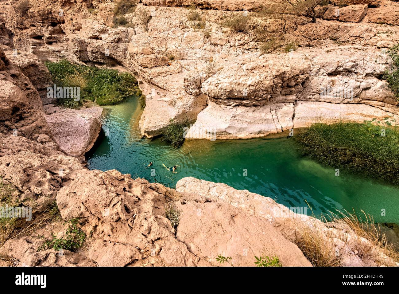 Turquoise water flowing through the Wadi Shab canyon, Wadi Ash Shab ...