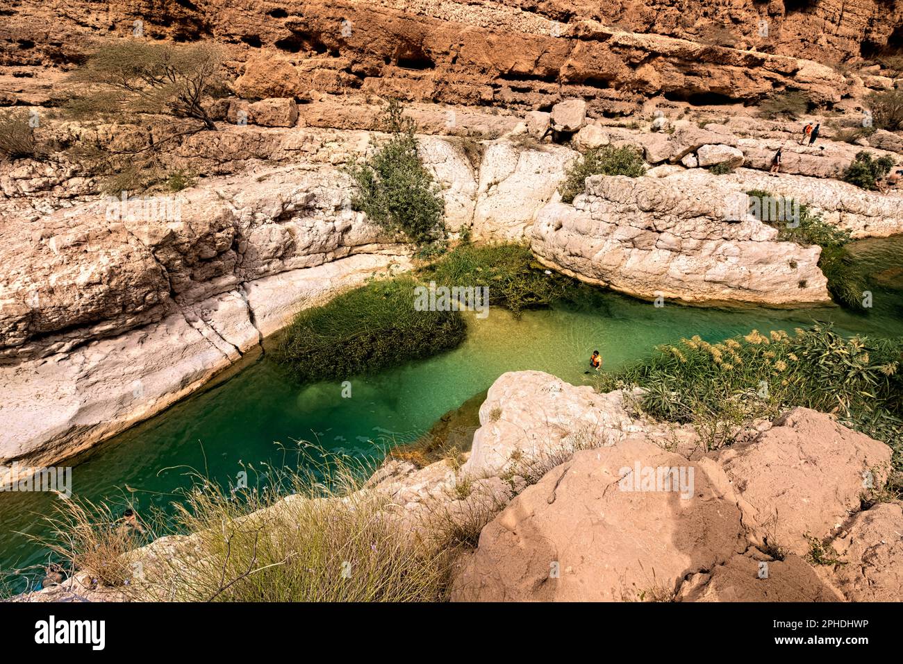 Turquoise water flowing through the Wadi Shab canyon, Wadi Ash Shab ...