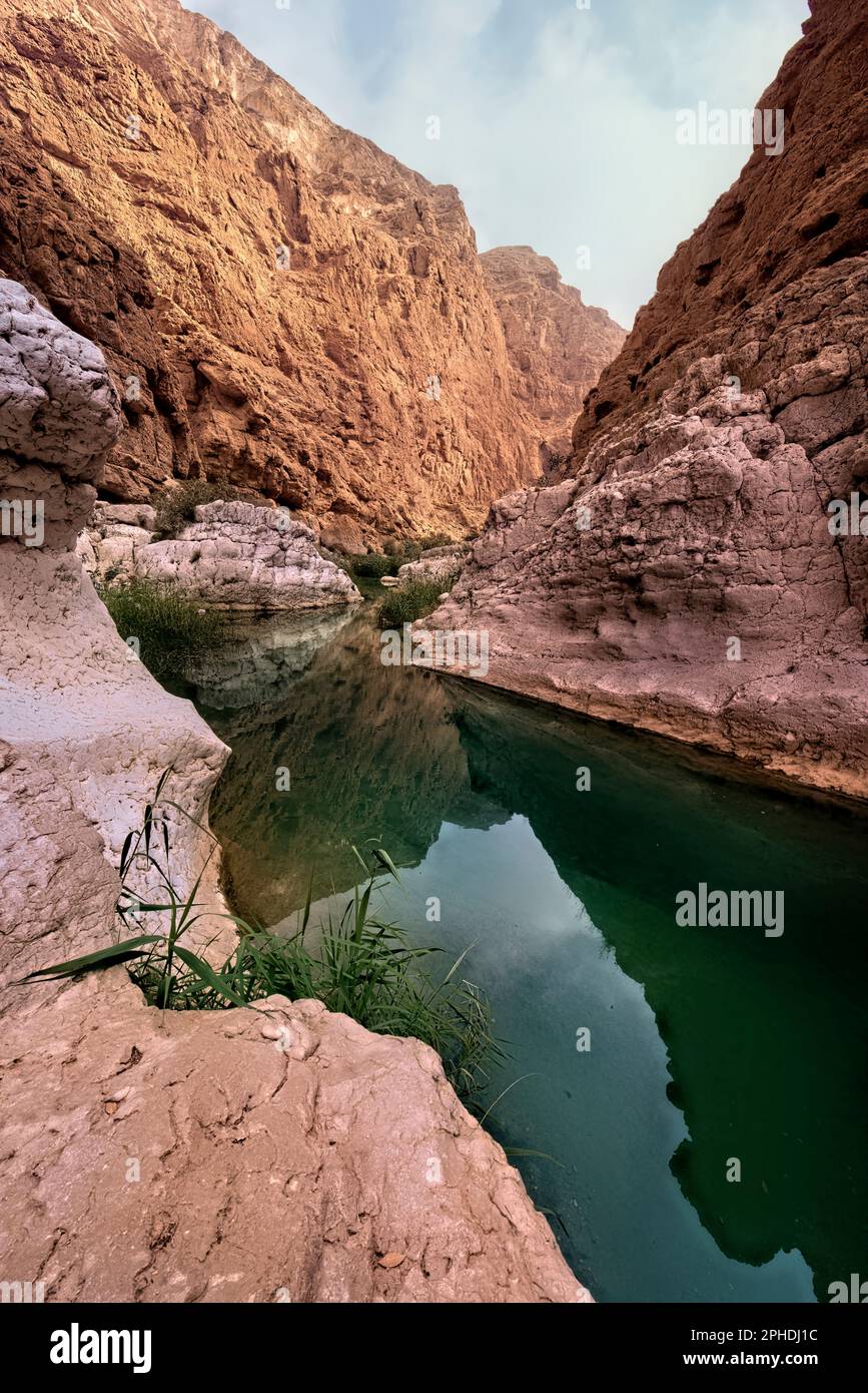 Turquoise water flowing through the Wadi Shab canyon, Wadi Ash Shab ...