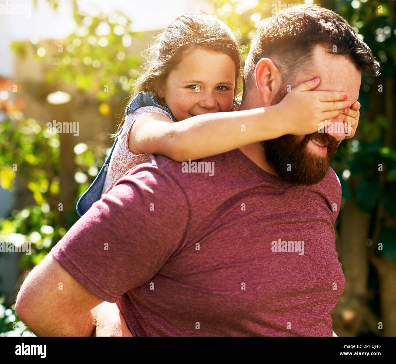 Peek a boo Guess who loves you. an adorable little girl playing ...