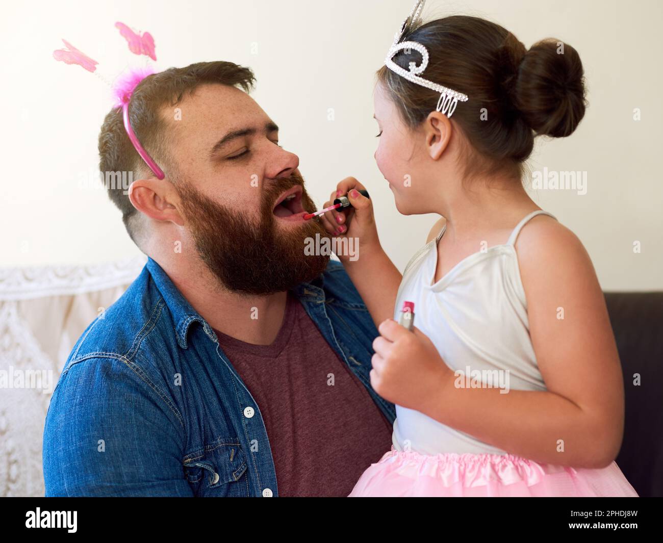 Youre going to love this lipstick, Dad. an adorable little girl putting ...
