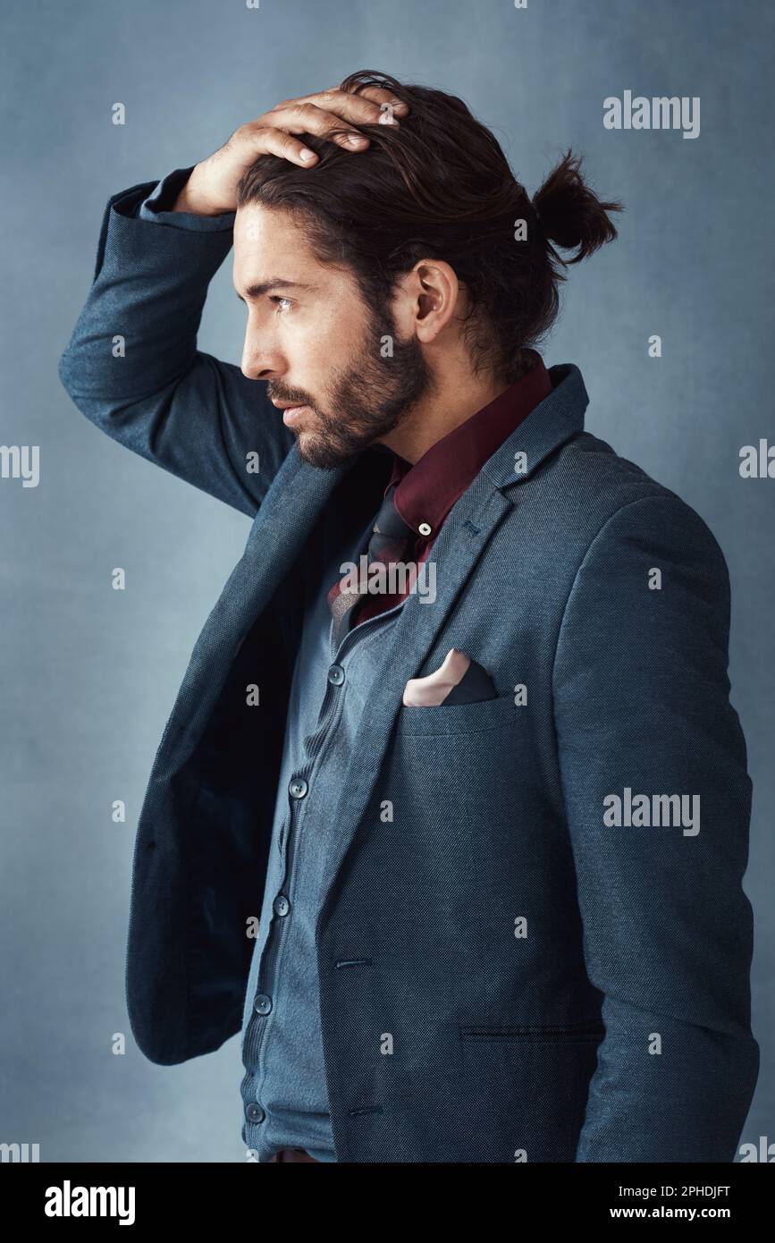 Style starts from the top. Studio shot of a handsome and dapper young ...