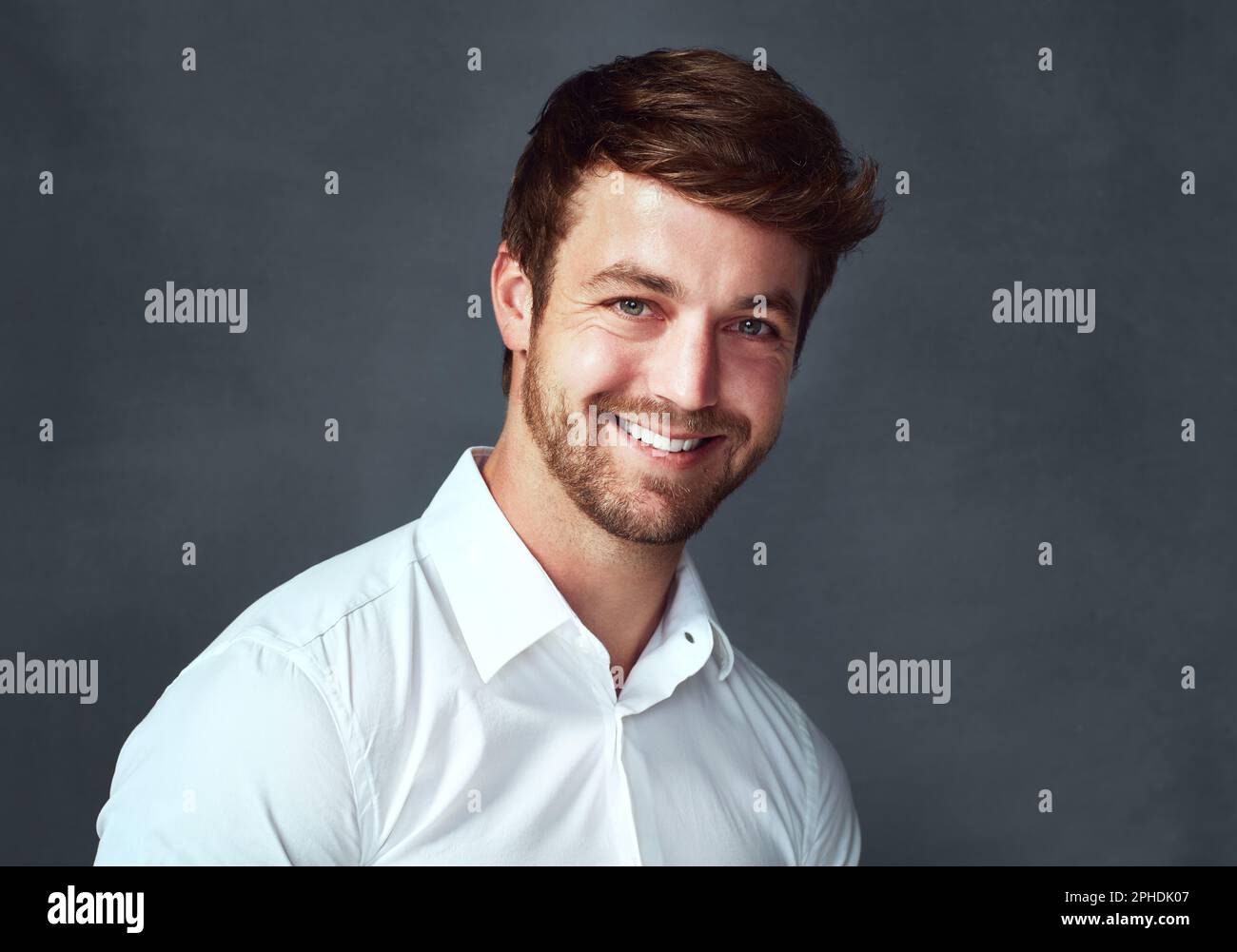 Hes a stand up style. Studio portrait of a handsome young man posing ...