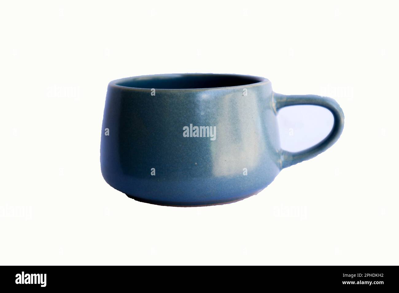 blue ceramic mug. Isolated on a white background Stock Photo - Alamy