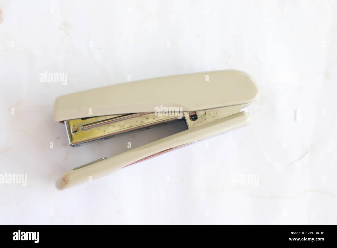 white stapler isolated on a white background Stock Photo - Alamy