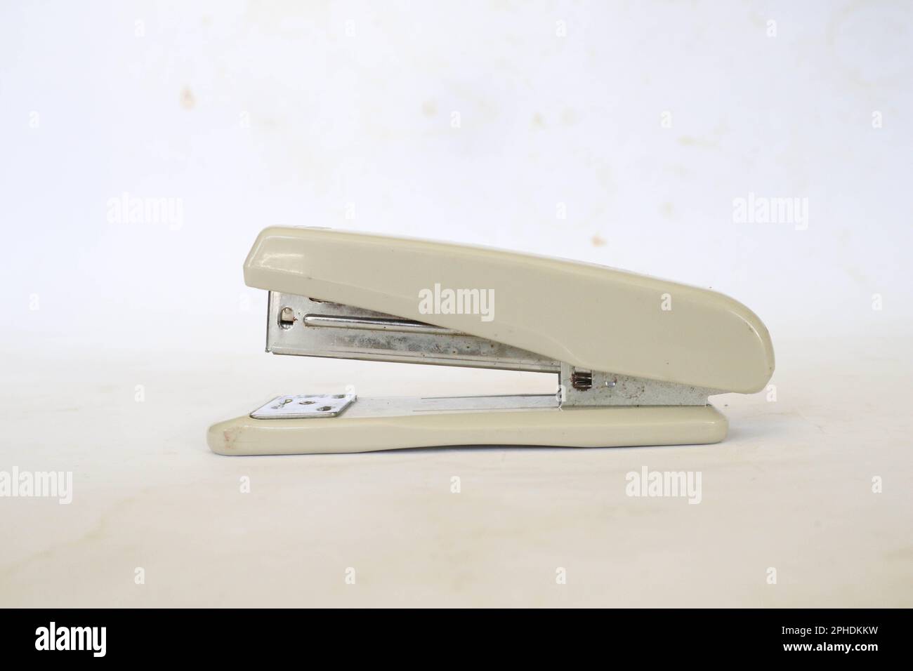 white stapler isolated on a white background Stock Photo - Alamy