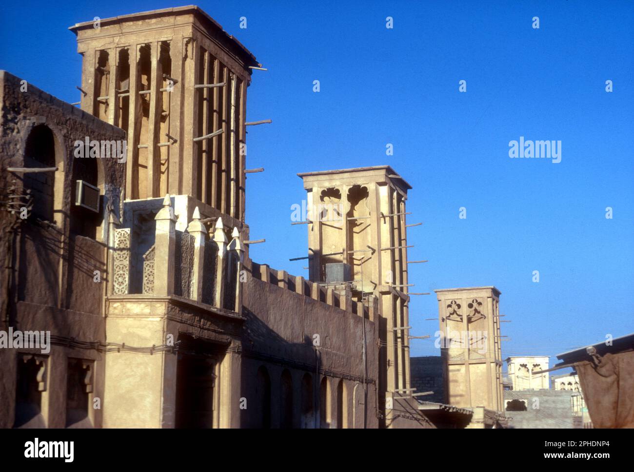 Traditional wind-towers or badgirs on an old mansion in Dubai, 1979 ...