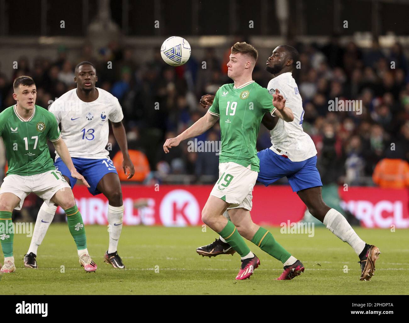 Evan Ferguson of Ireland, Dayot Upamecano of France, left Jason Knight ...
