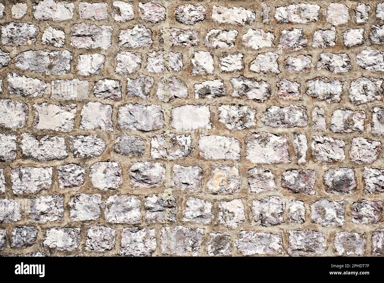 Stone bricks gray tiled road texture with pebbles and concrete ...