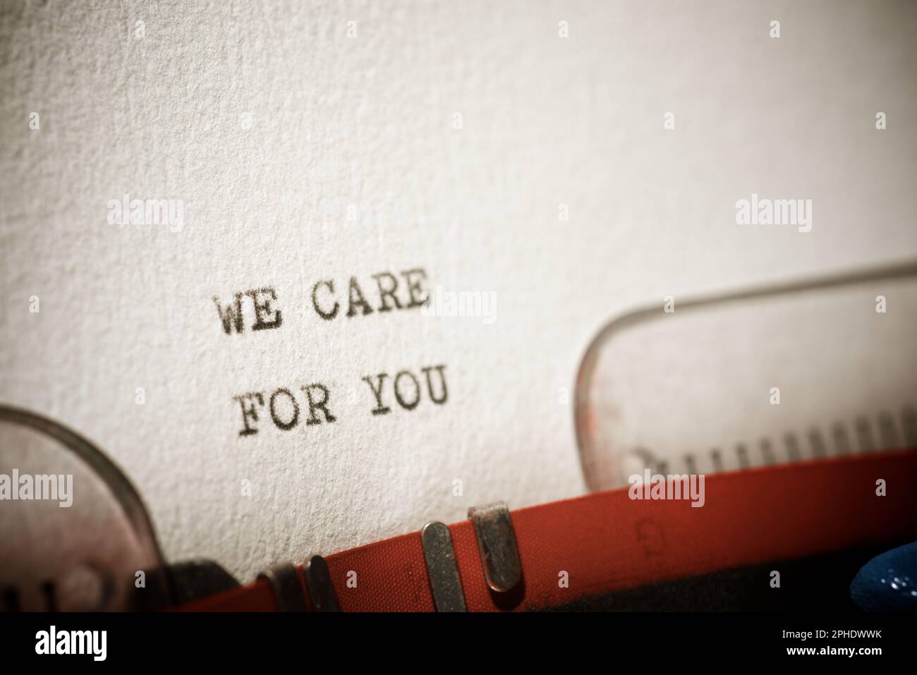 We care for you text written with a typewriter Stock Photo - Alamy