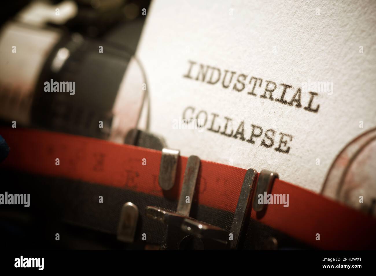 Industrial collapse text written with a typewriter Stock Photo - Alamy