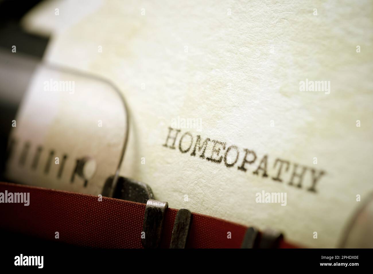 Homeopathy word written with a typewriter Stock Photo - Alamy