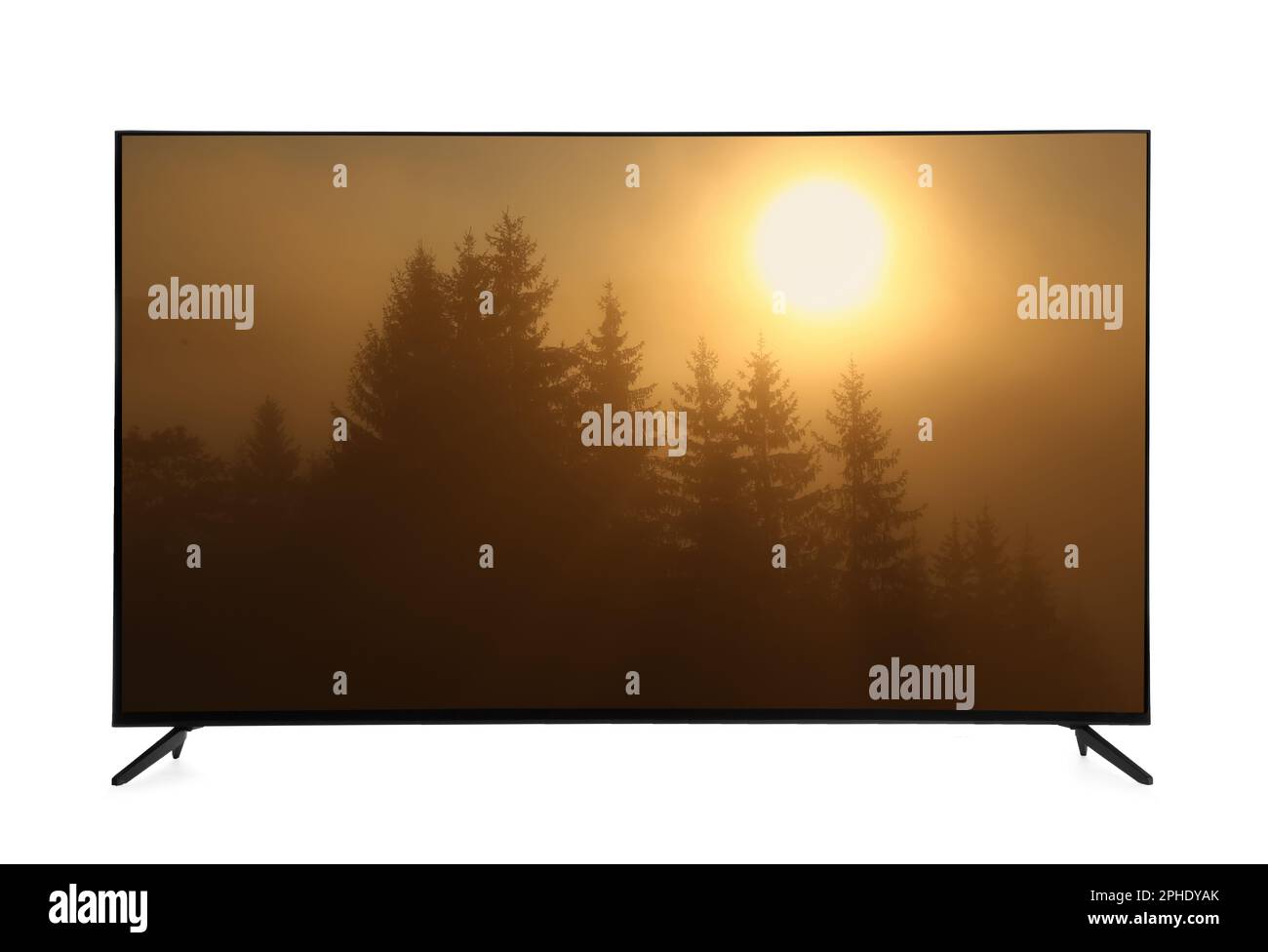 Modern wide screen TV monitor showing foggy forest at sunrise isolated ...
