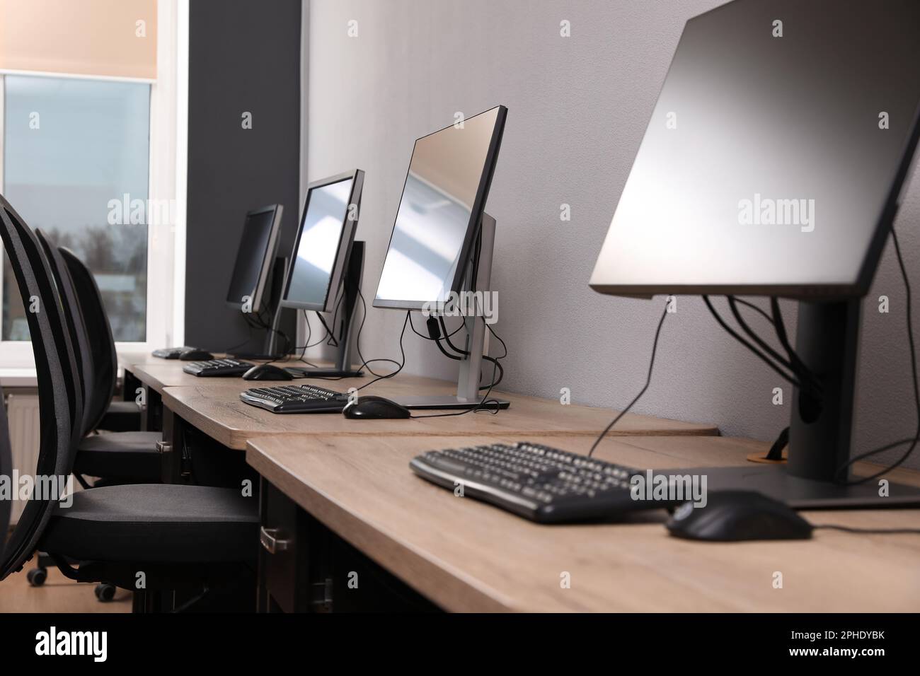 Workplace room computers in row hi-res stock photography and images - Alamy