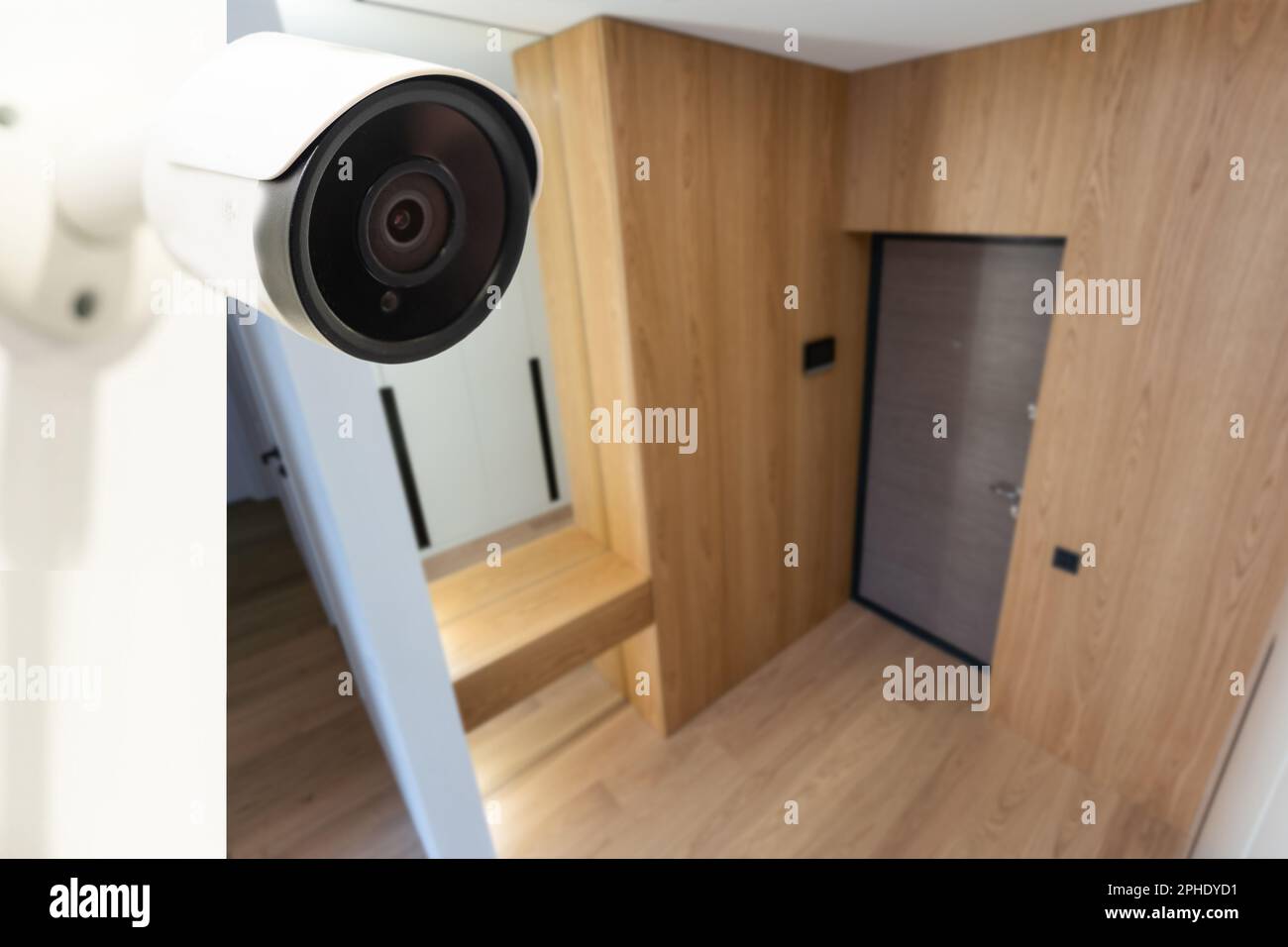 Modern CCTV camera installed in entryway of apartment building Stock ...