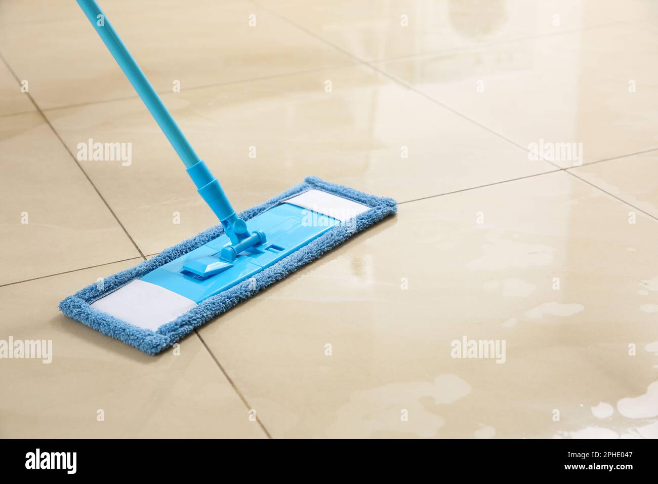 Washing of floor with mop, closeup. Space for text Stock Photo - Alamy