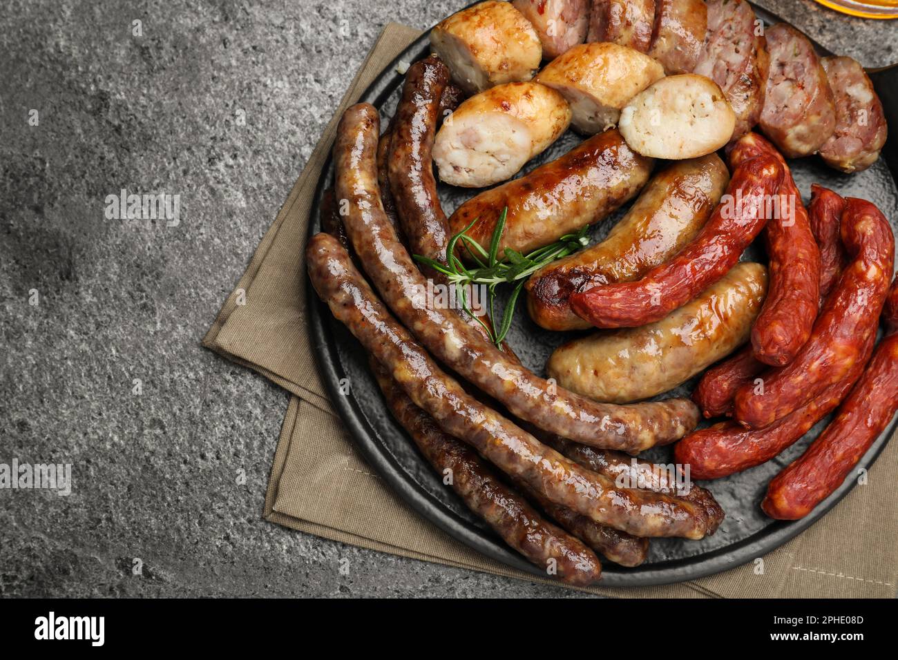 Set of different tasty snacks on dark grey table, top view Stock Photo ...