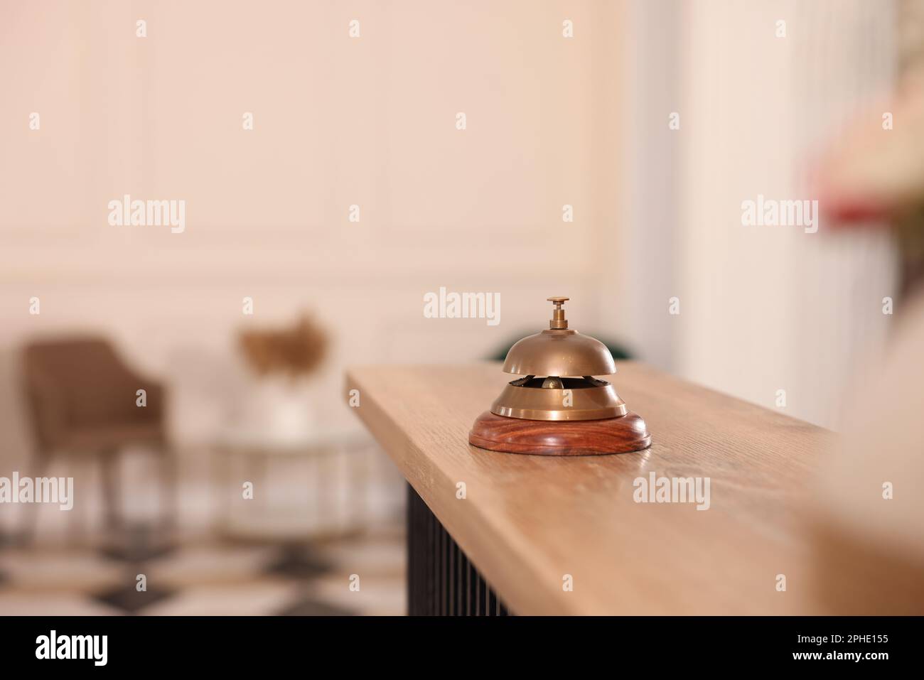 Hotel service bell on wooden reception desk. Space for text Stock Photo ...