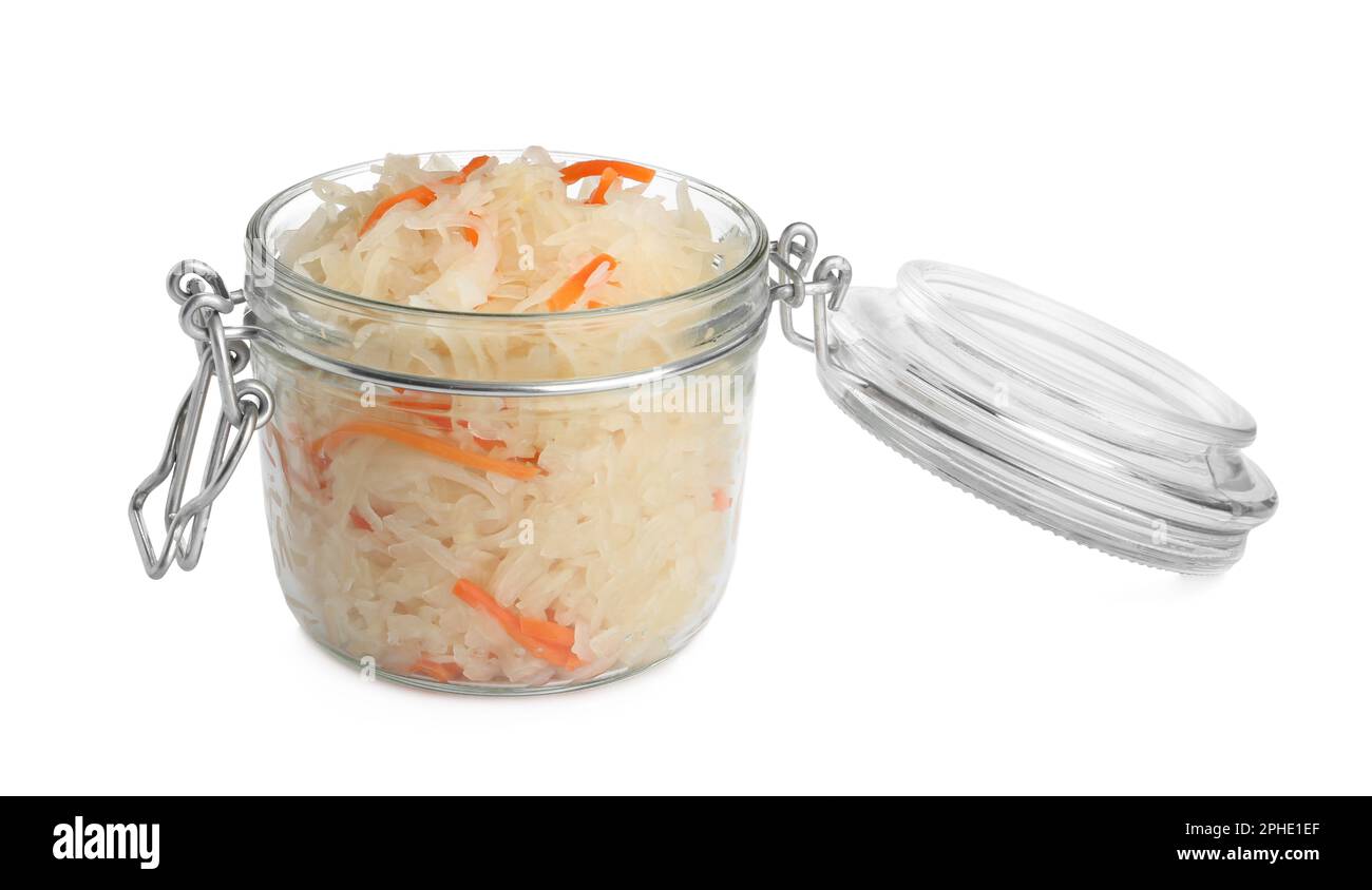 Glass jar of tasty fermented cabbage with carrot on white background ...