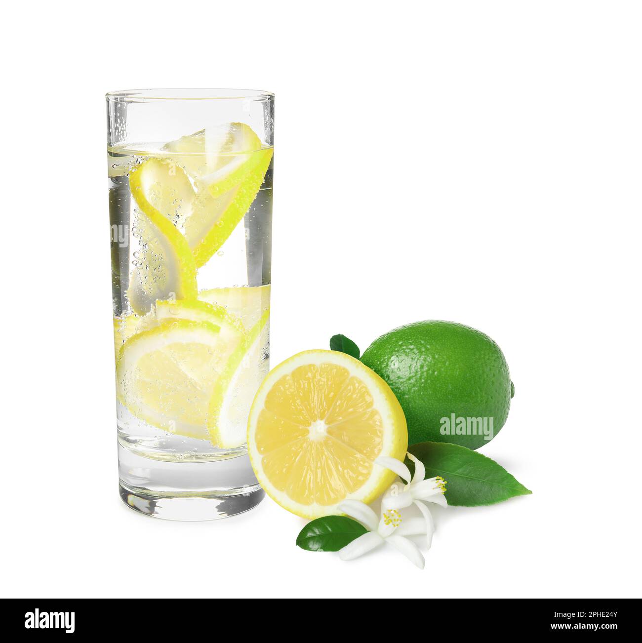 Glass with tasty lemonade and fresh ripe citrus fruits on white ...
