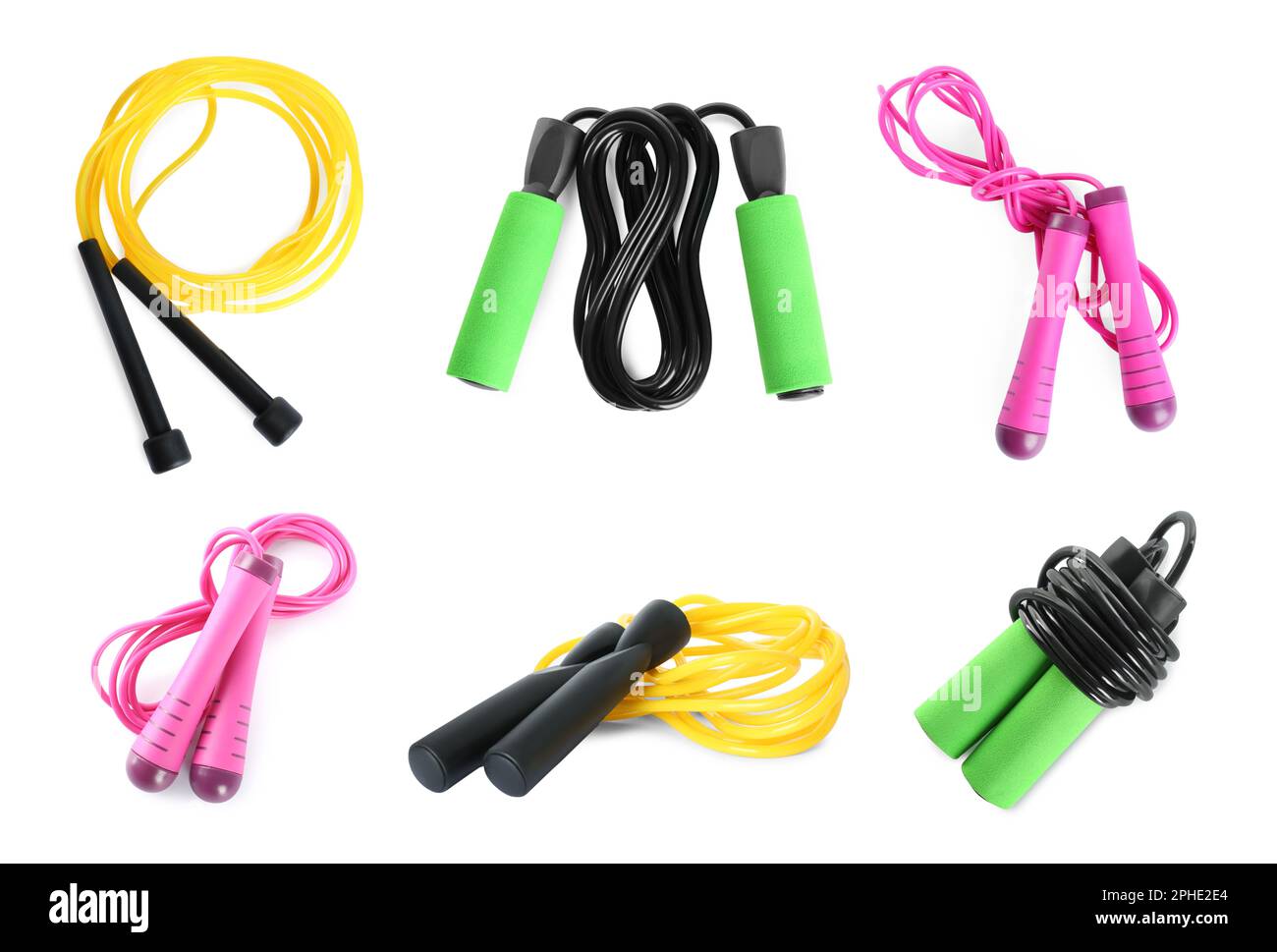 Set with different skipping ropes on white background Stock Photo - Alamy