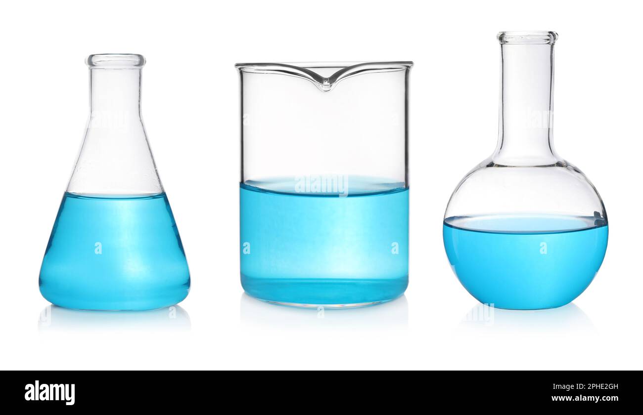 Different laboratory glassware with light blue samples on white ...