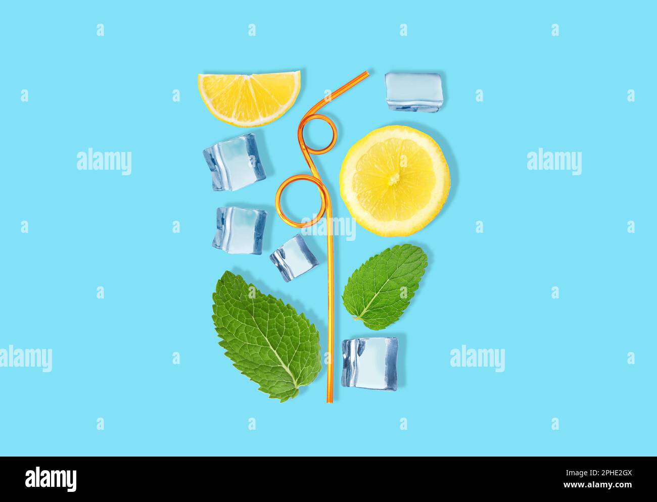 Creative lemonade layout with lemon slices, mint, ice cubes and straw ...