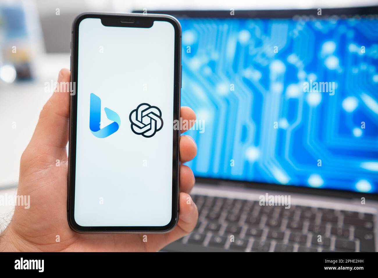Bing AI GPT logo of neural network on the screen of smartphone in mans ...