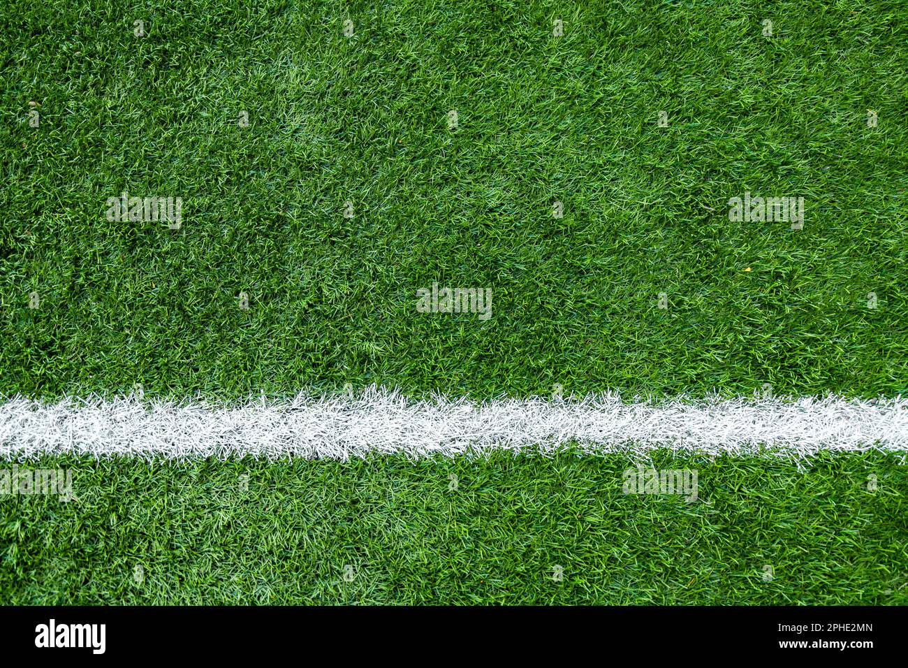 White stripe markings on the green grass of the sports field Stock ...