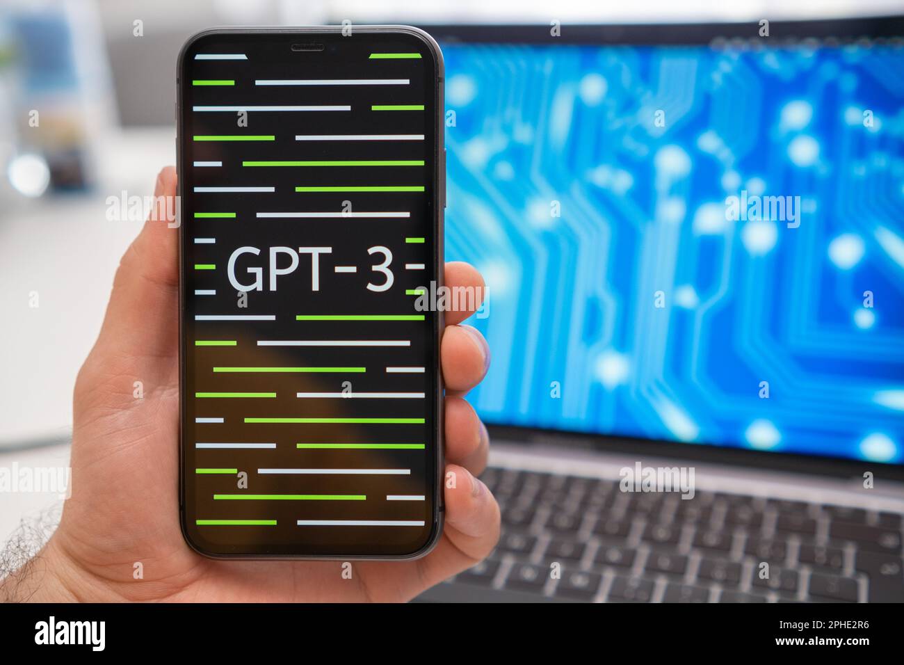 GPT 3 logo on the smartphone and neural network on the laptop display ...