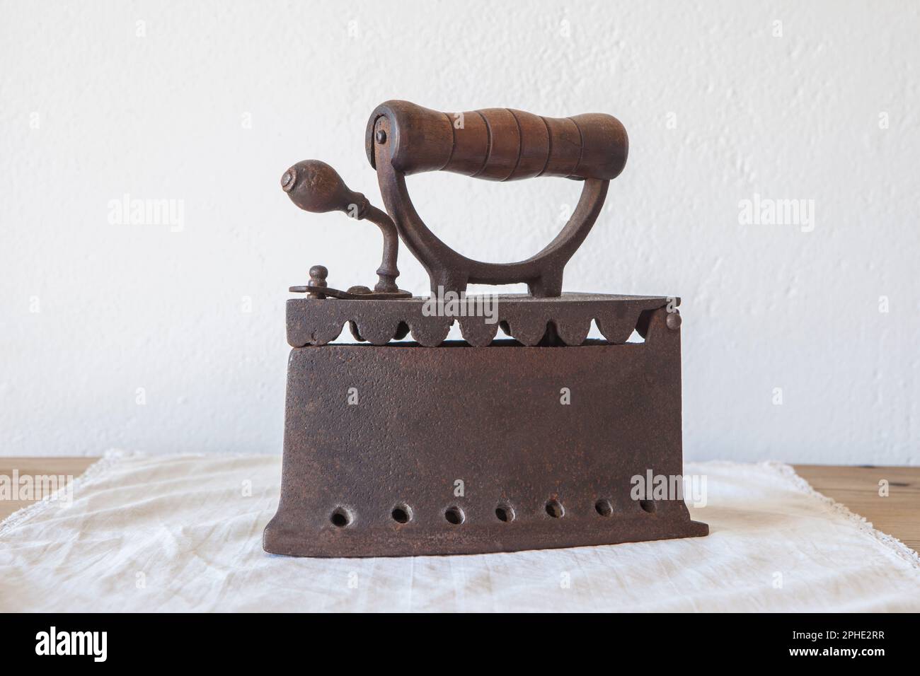 Old rusty charcoal iron. Country style background Stock Photo - Alamy