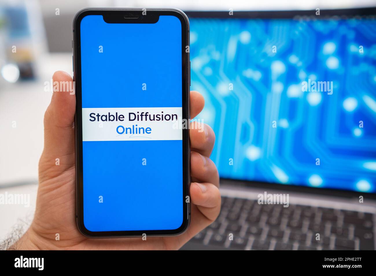 Stable Diffusion Online logo of neural network on the screen of the smartphone in mans hand and ...
