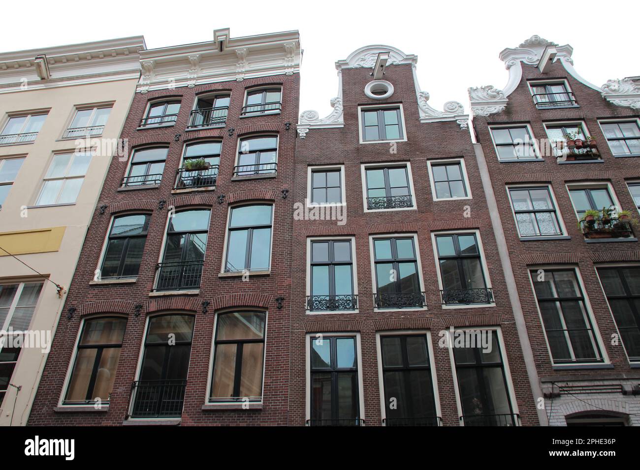 old brick houses in amsterdam (the netherlands Stock Photo - Alamy