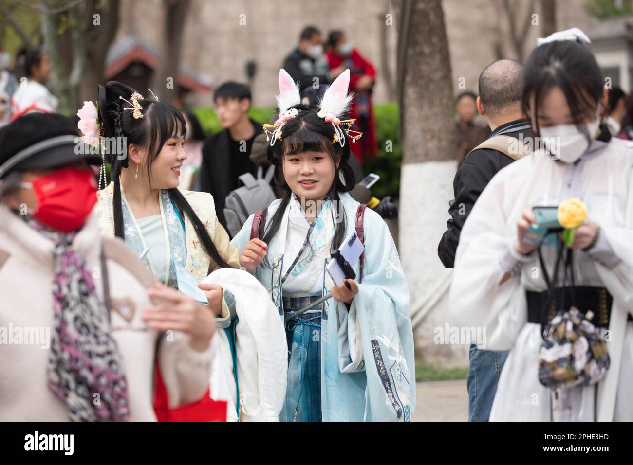 College students wearing hanfu visit the Second Daming Lake Flower Festival in Jinan City, east ...