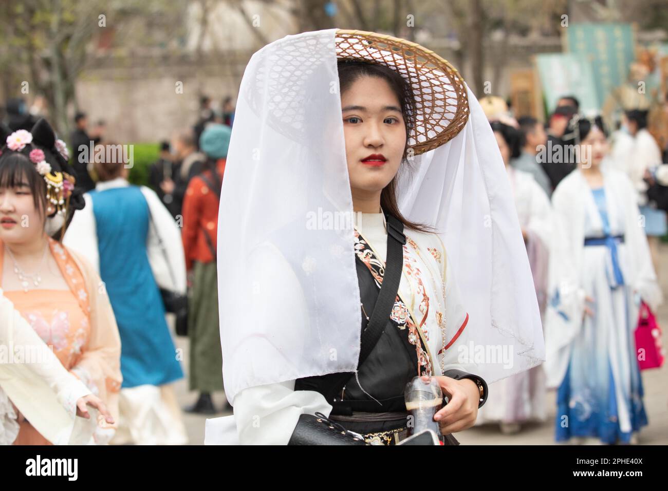 College students wearing hanfu visit the Second Daming Lake Flower Festival in Jinan City, east ...