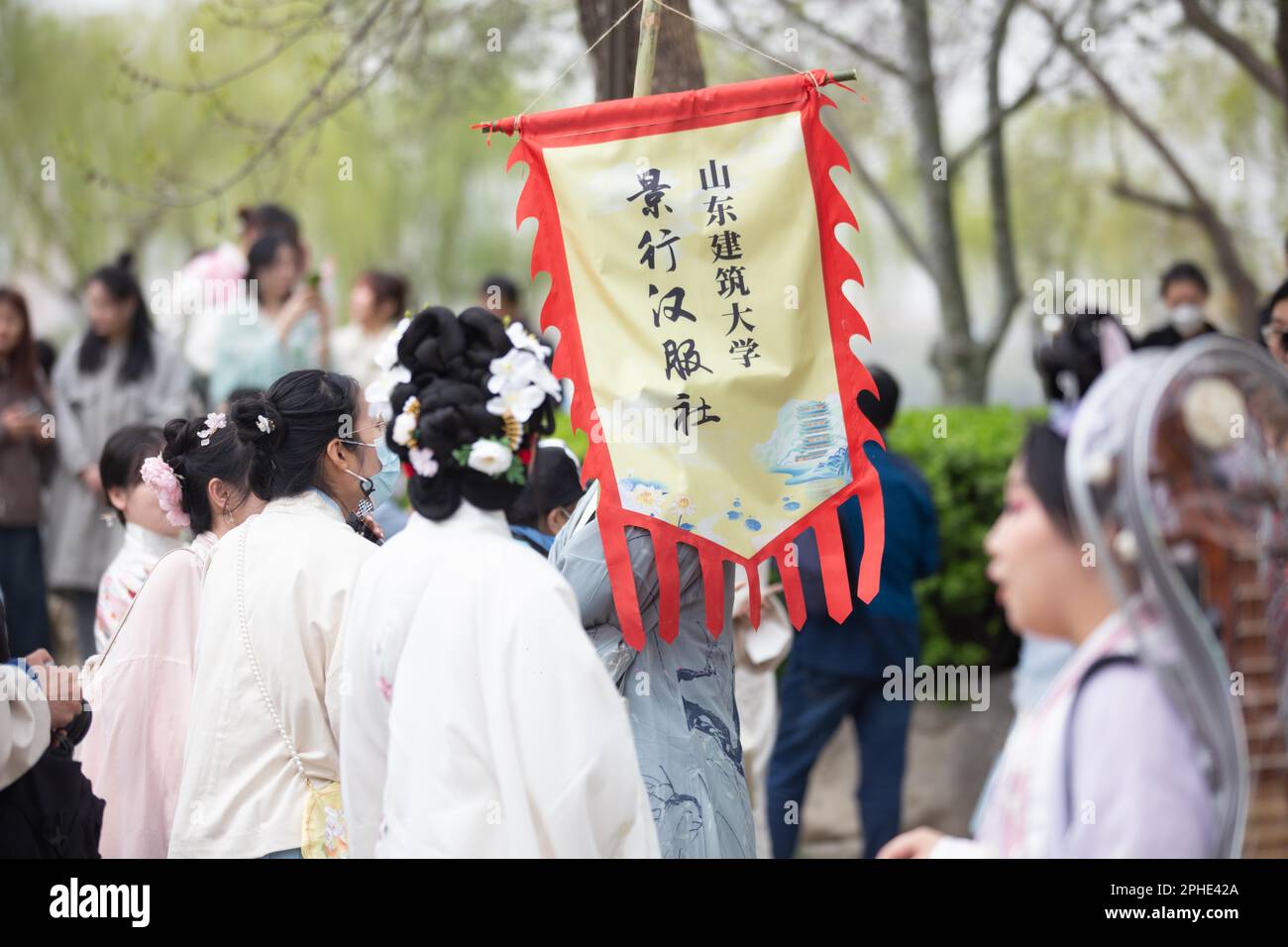 College students wearing hanfu visit the Second Daming Lake Flower Festival in Jinan City, east ...