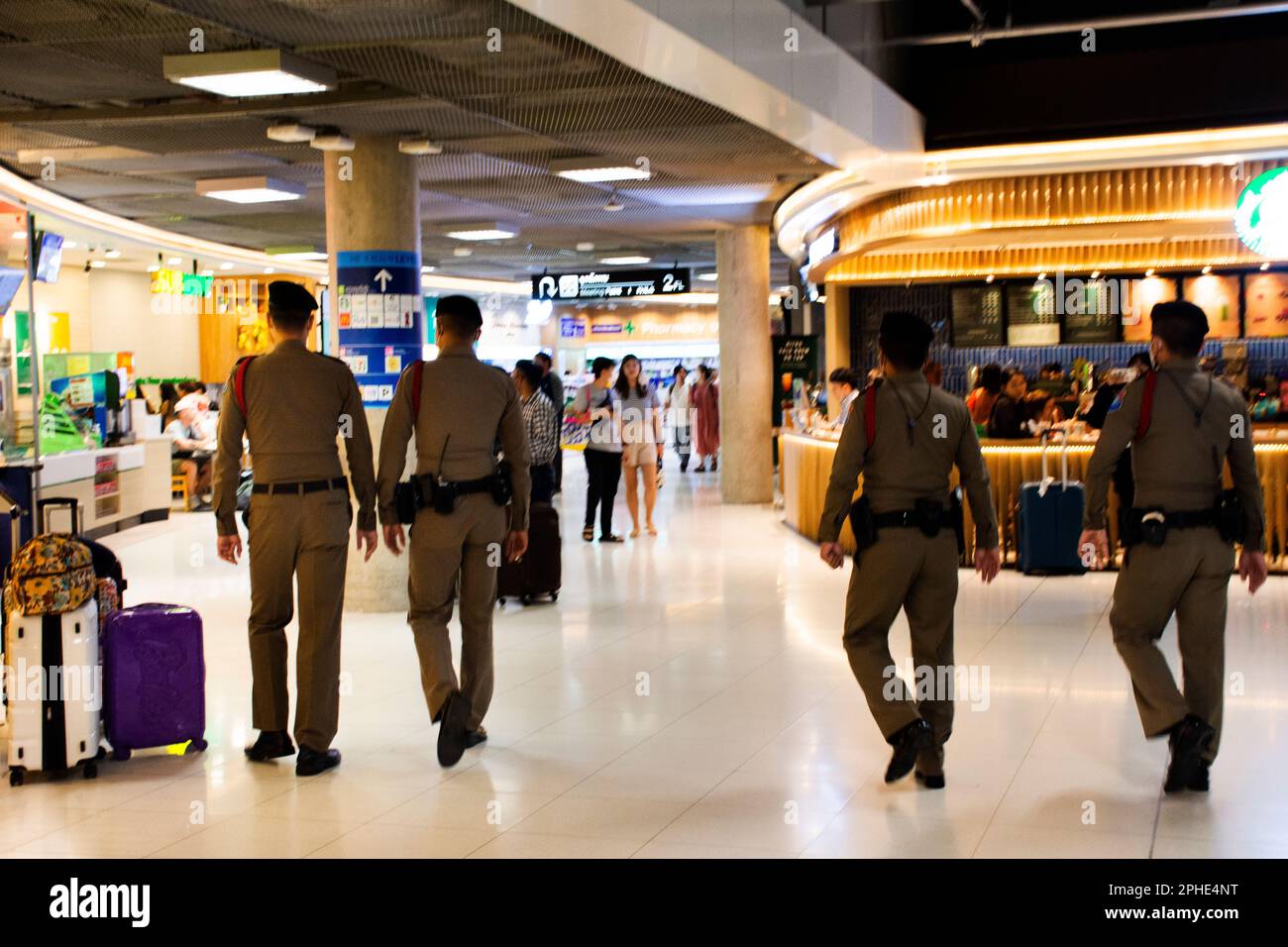 Security airport policemen guard walking monitor watch out for service ...
