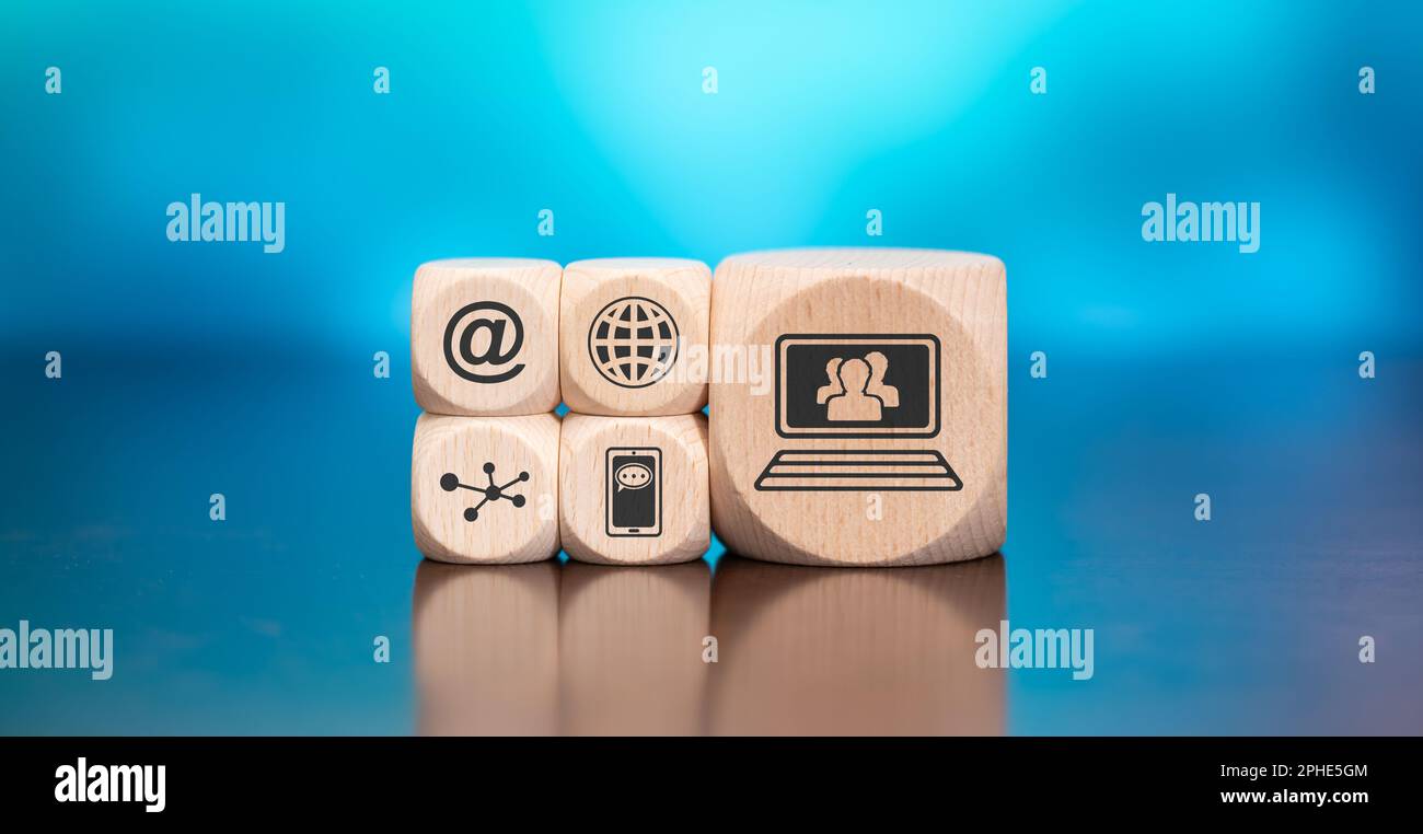 Wooden blocks with symbol of social media concept on blue background ...