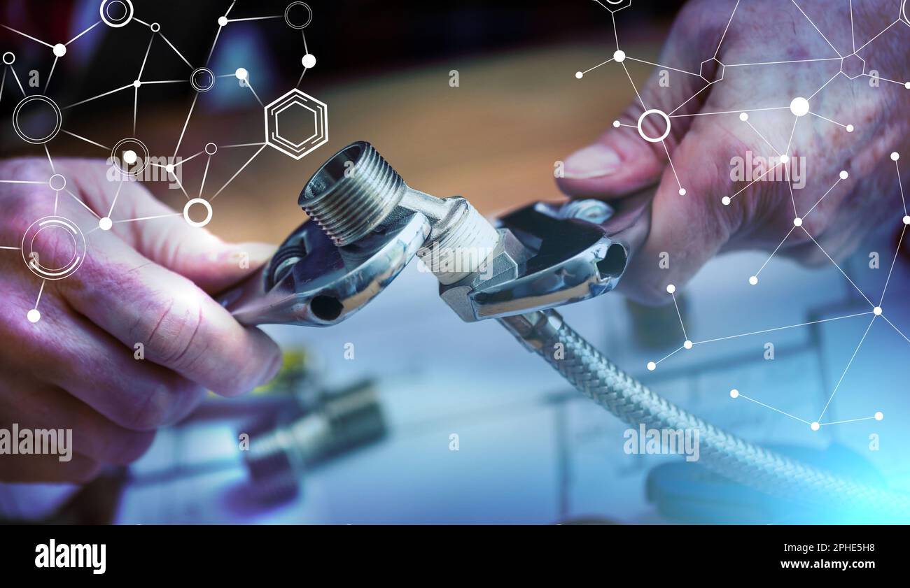 Plumber screwing a plumbing fitting on a pipe; light effect Stock Photo ...