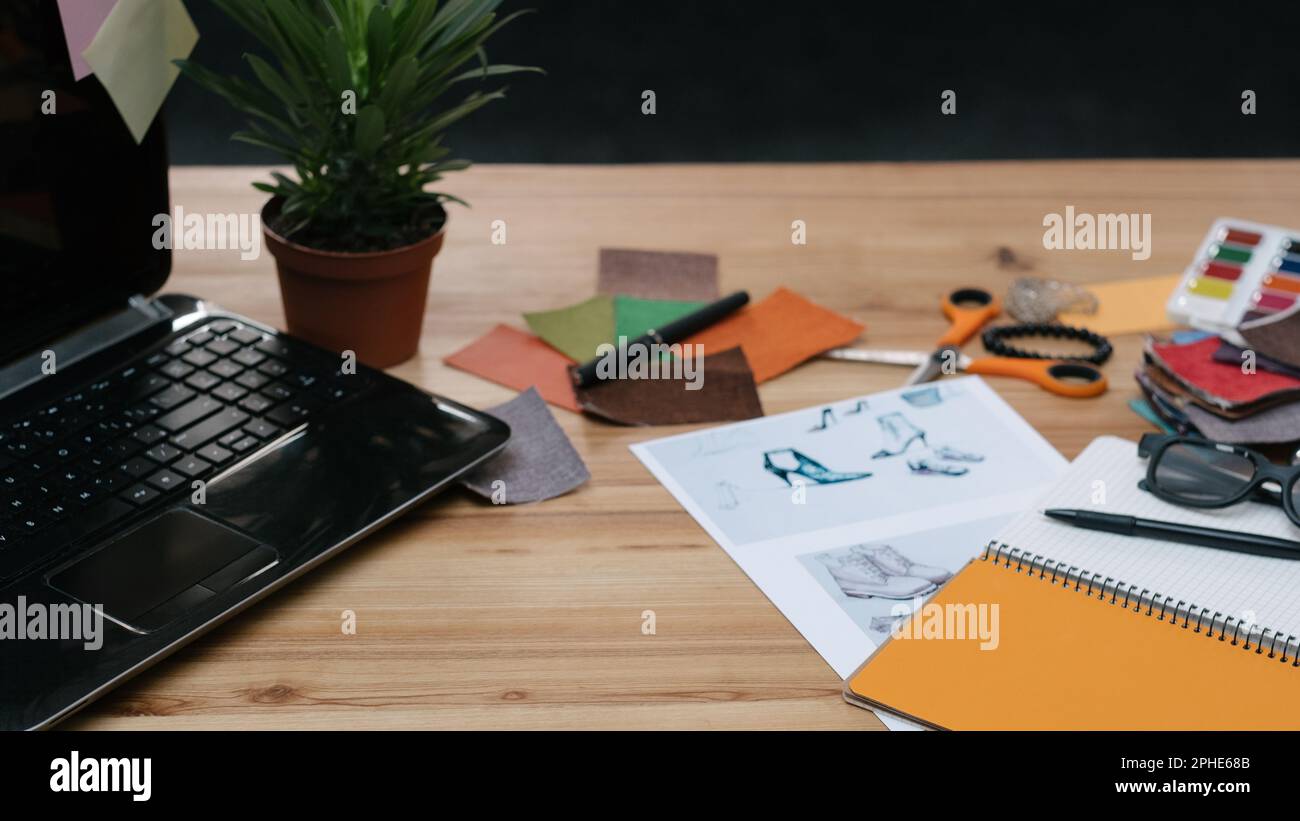 fashion designer work process business workspace Stock Photo - Alamy